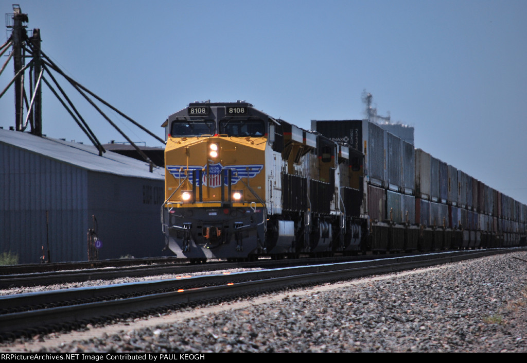 UP 8108 with UP 8096, and UP 8068 behind Her and UP 8109 at the Rear waits for a westbound Z to ...